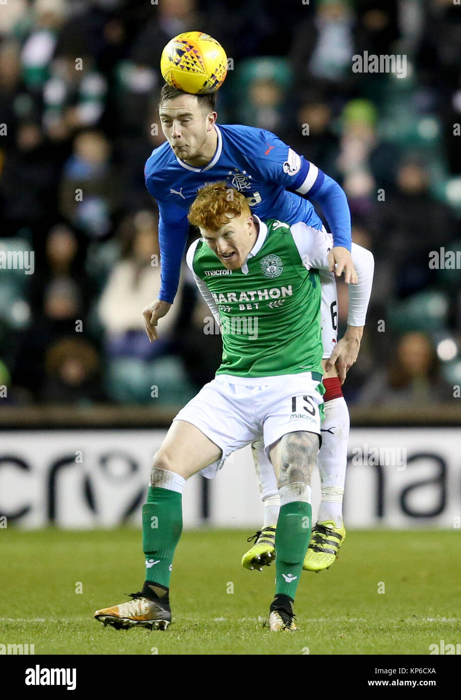 Hibernian's Simon Murray and Rangers' Danny Wilson battle for the ball ...