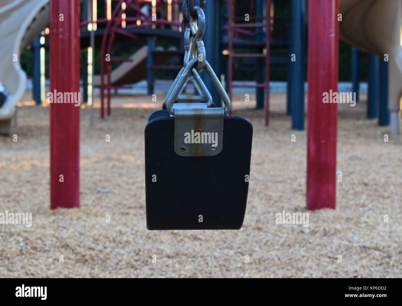 Side View of Swing with Playground in Background at Castle View Park ...
