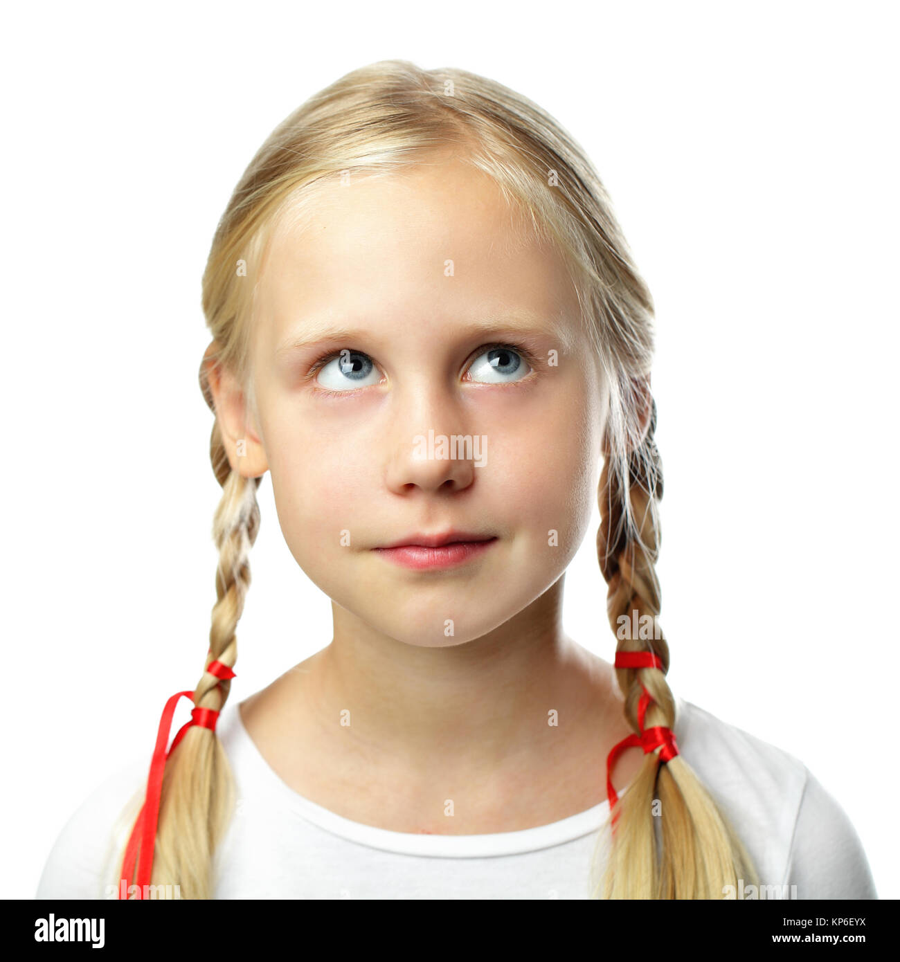 Cute small girl looking up Stock Photo - Alamy