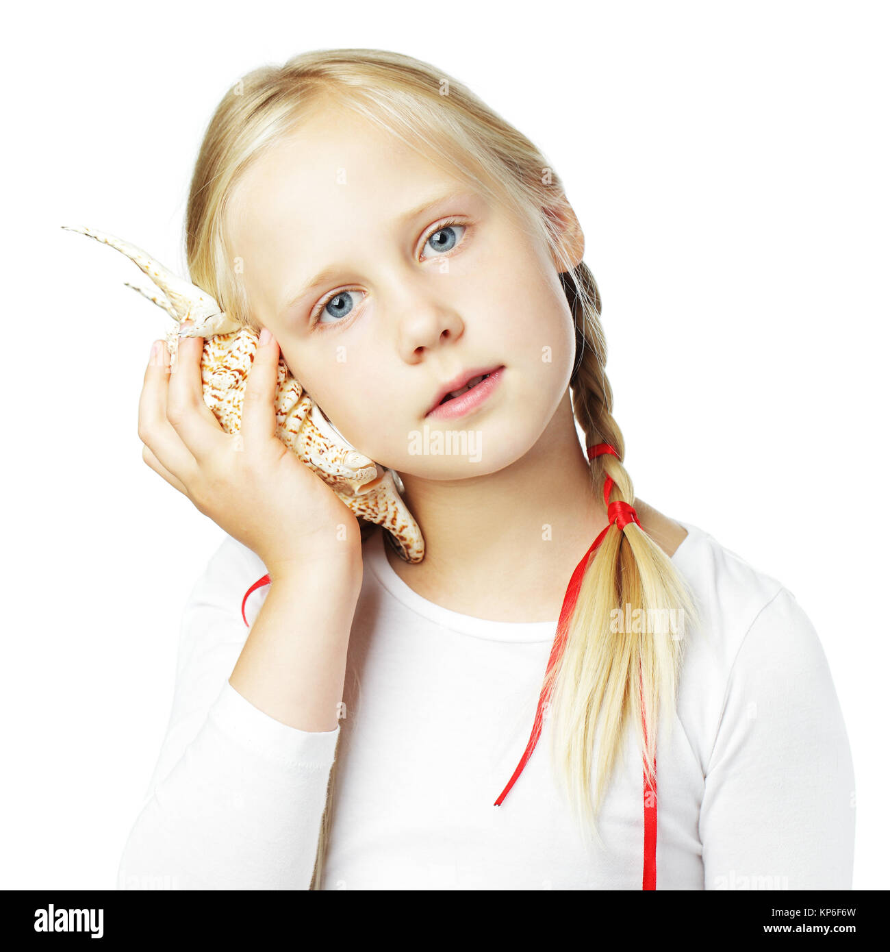 Girl with sea shell Stock Photo - Alamy