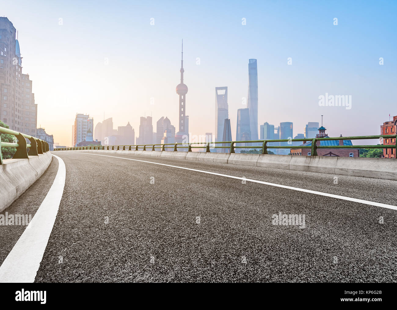empty asphalt road through modern city in China Stock Photo - Alamy