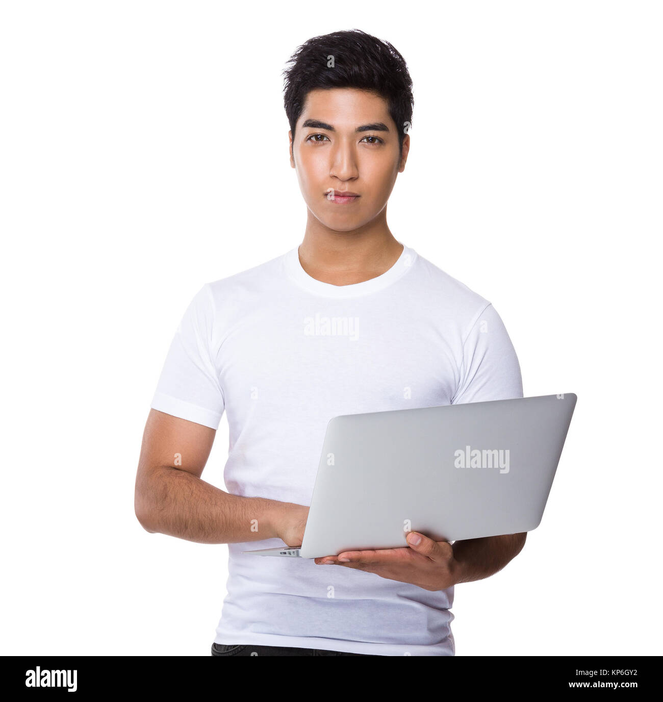 Asian teen guy on a laptop hi-res stock photography and images - Alamy