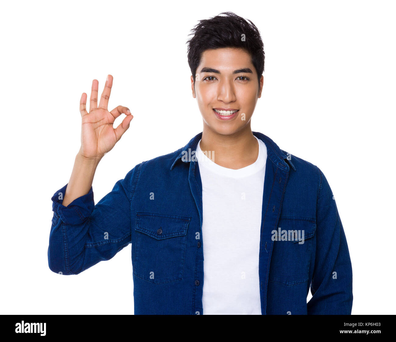 Indian man with ok sign gesture Stock Photo - Alamy