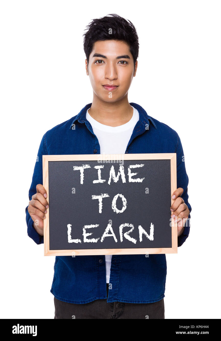 Indian man with chalkboard showing the phrases of time to learn Stock ...