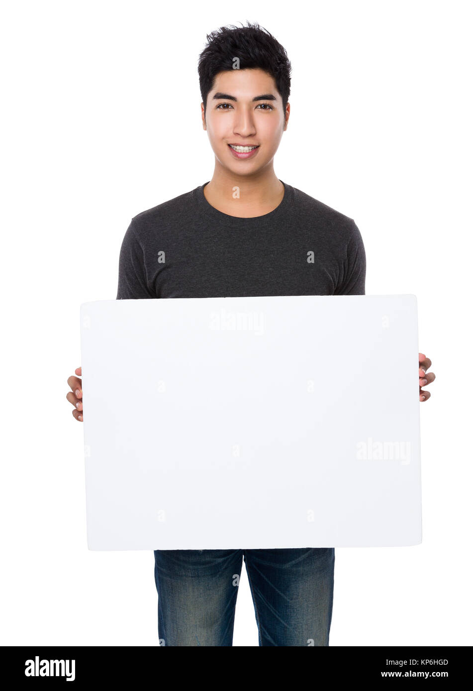 Young man show with white placard Stock Photo - Alamy