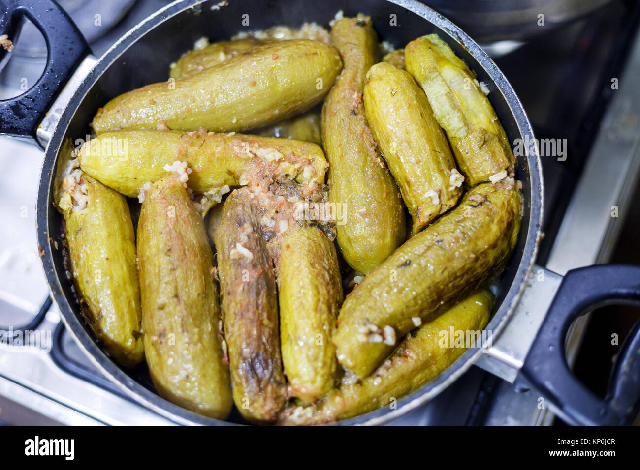 Stuffed zucchini (kousa mahshi) in cookware Stock Photo - Alamy