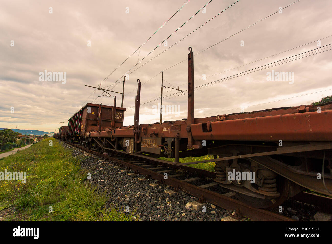 Diagonal view of a freight train stopped Stock Photo - Alamy