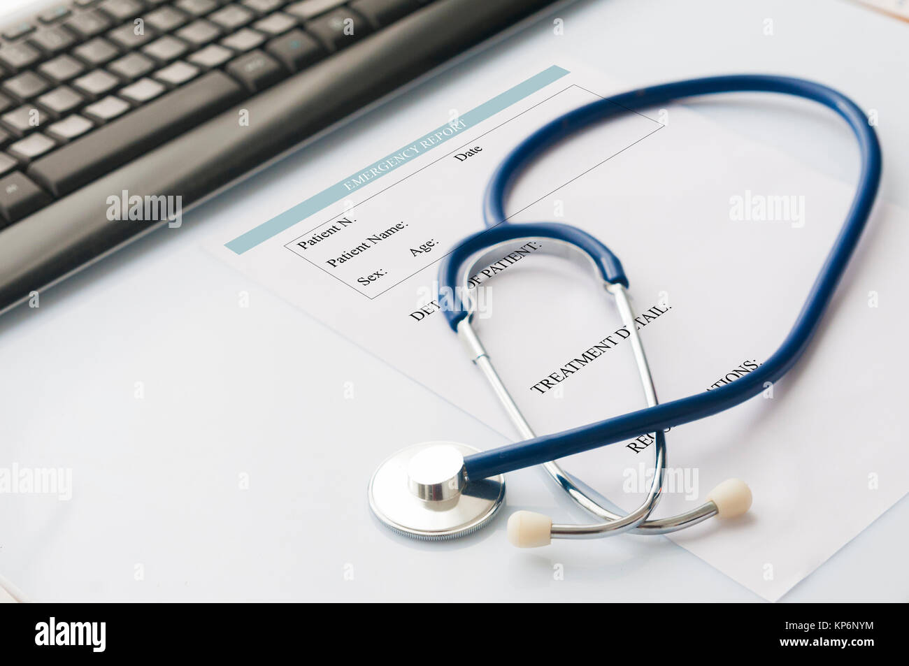 Desk with stethoscope and medical report Stock Photo - Alamy