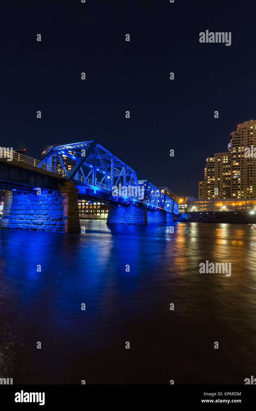 Blue Bridge at night, reflecting off the Grand River in Grand Rapids ...