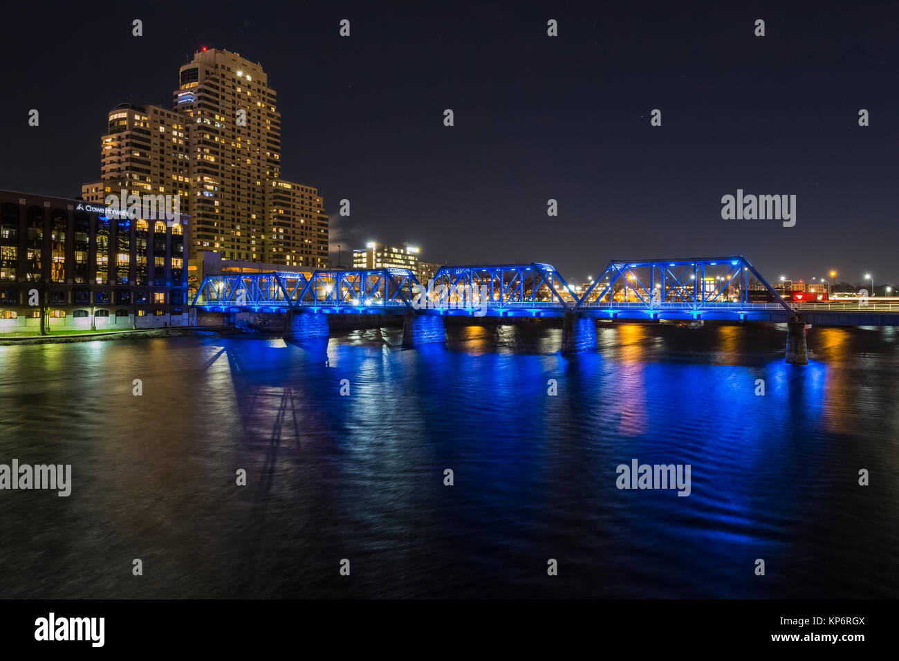 Blue Bridge at night, reflecting off the Grand River in Grand Rapids ...