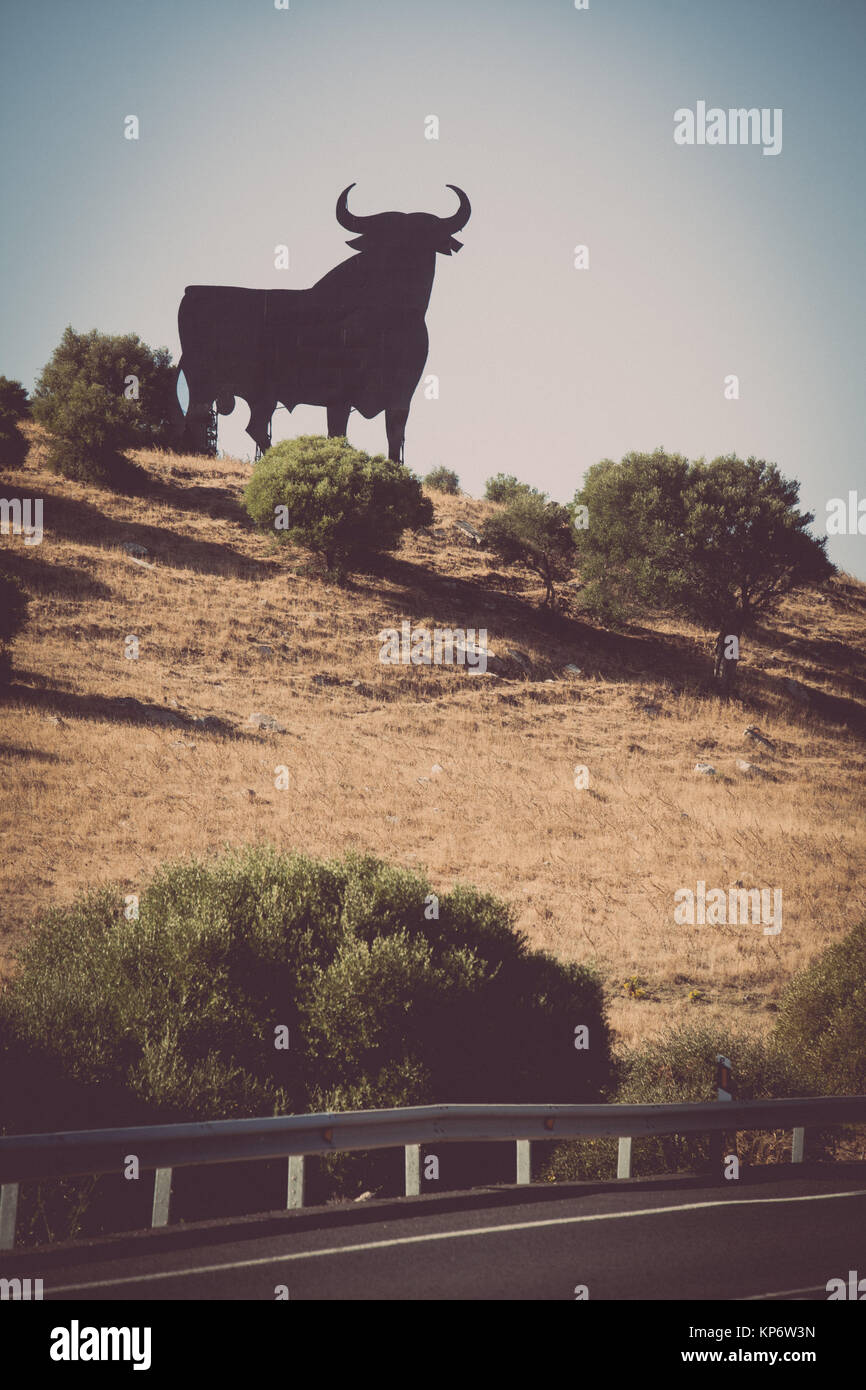 Bull-shaped billboard in Spain Stock Photo - Alamy