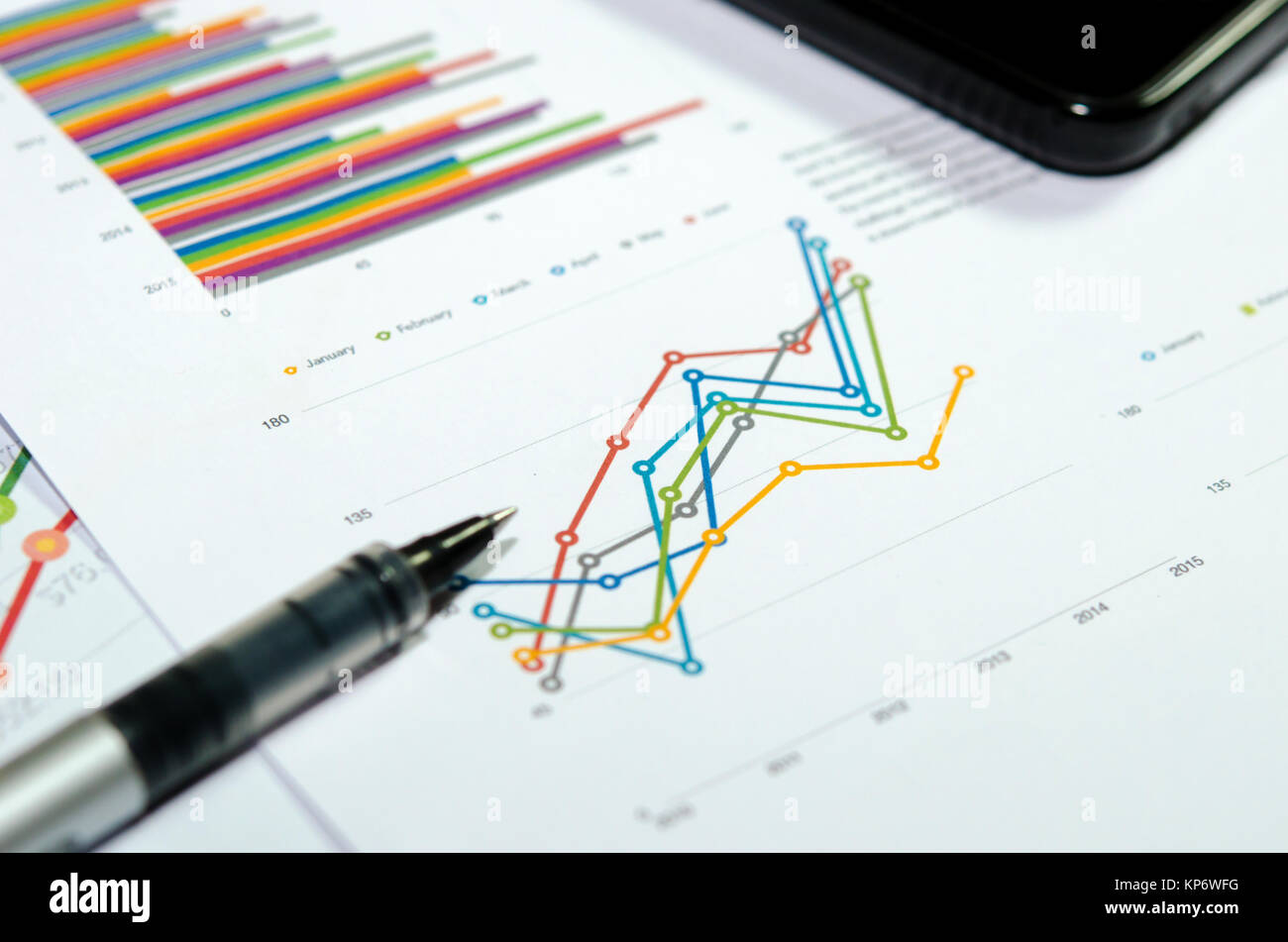 Graphs and pen Stock Photo - Alamy