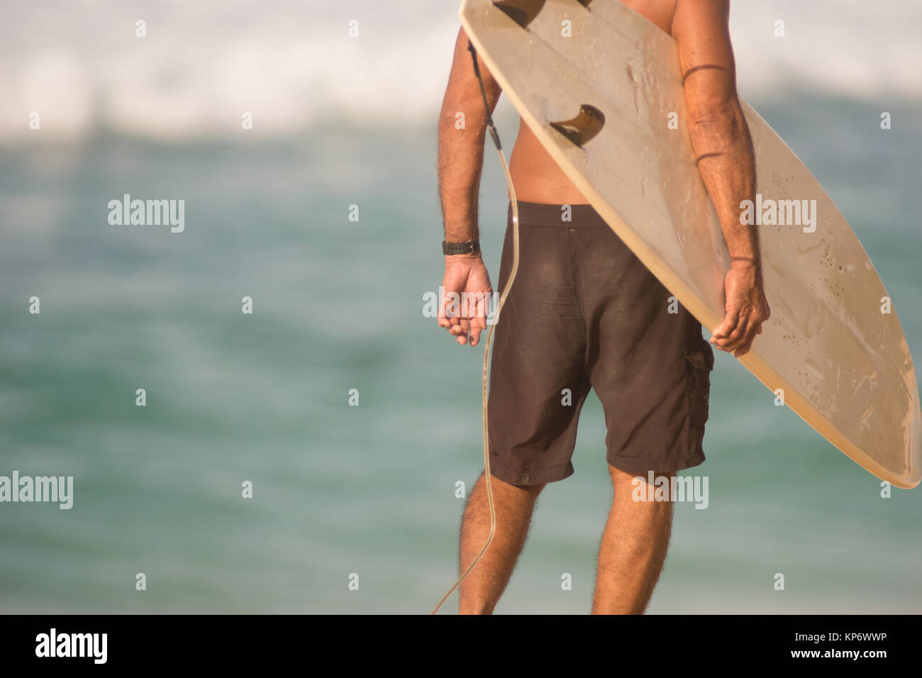 Male Surfer Stands Beach Watching Surf Waiting Surfboard Stock Photo ...