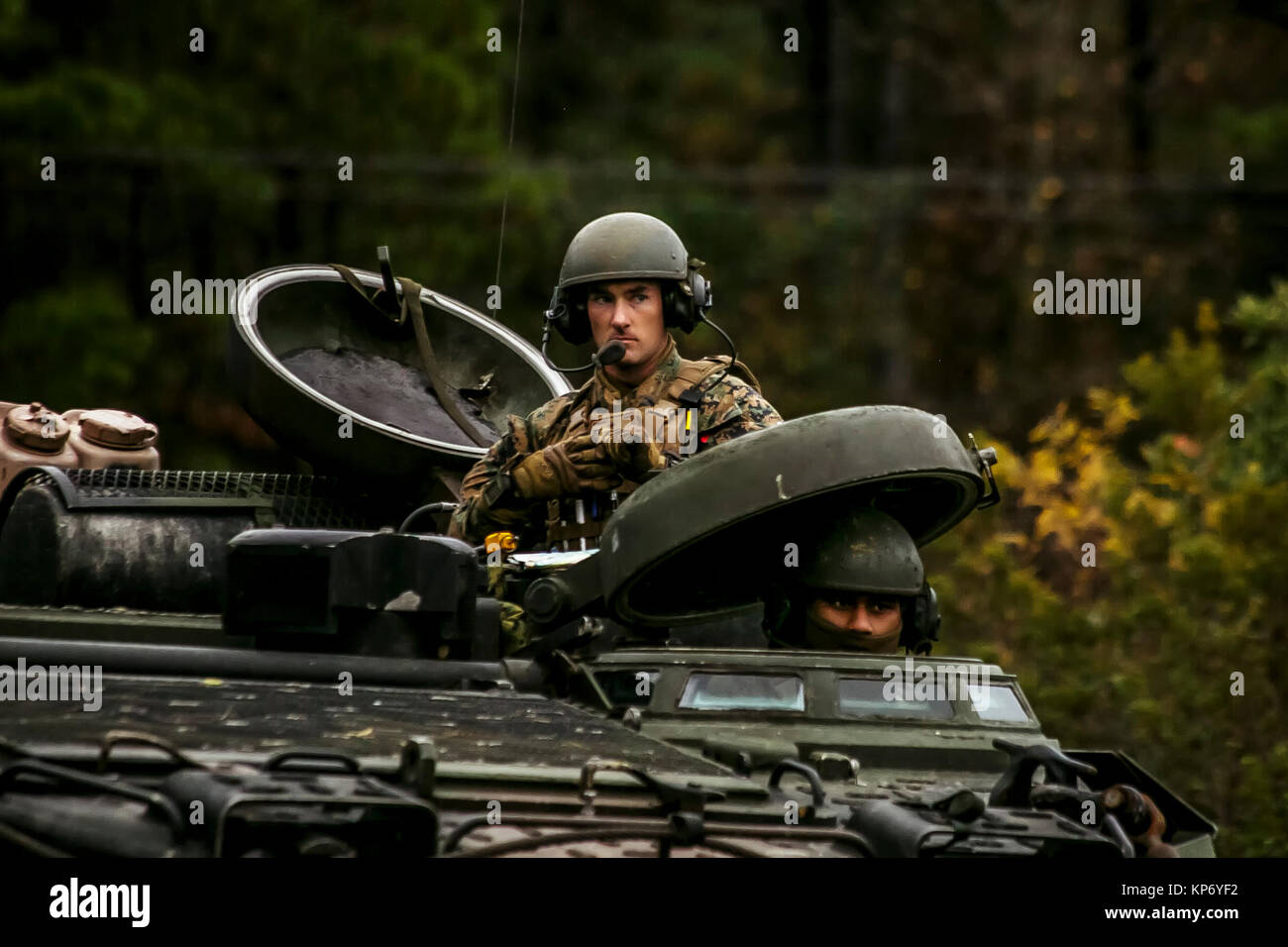 U.S. Marine Corps Capt. Joseph P. Murphy, top, commanding officer of ...