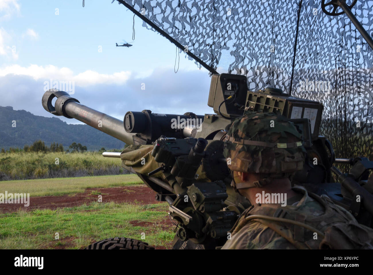Spc. Ryan Reliford, a gunner 2nd Battalion, 11th Field Artillery ...