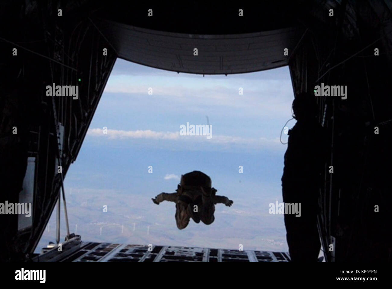 A paratrooper free-falls from a C-130 aircraft during the 5th ...