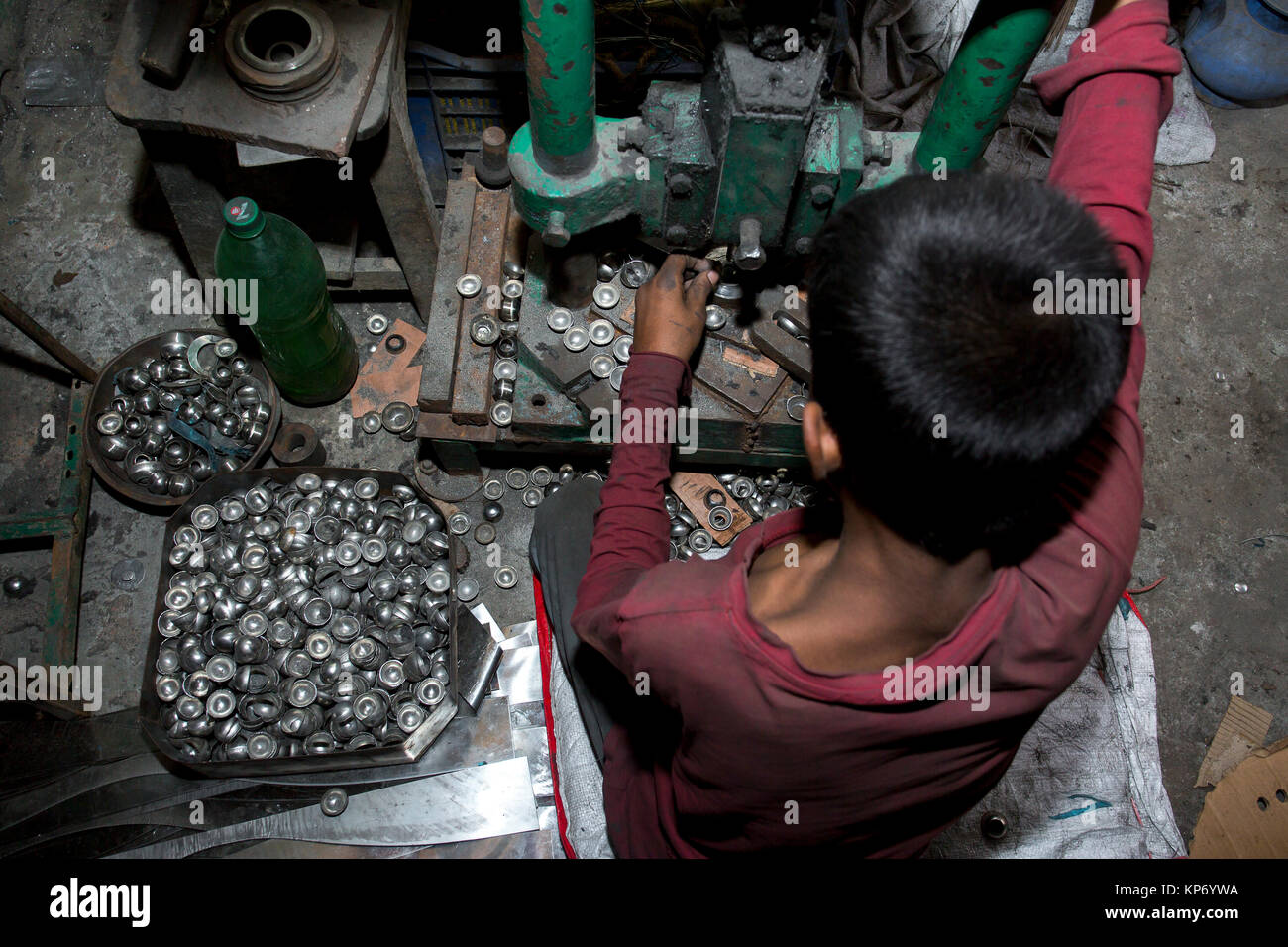 A child labors are working steel ball making factory Stock Photo - Alamy