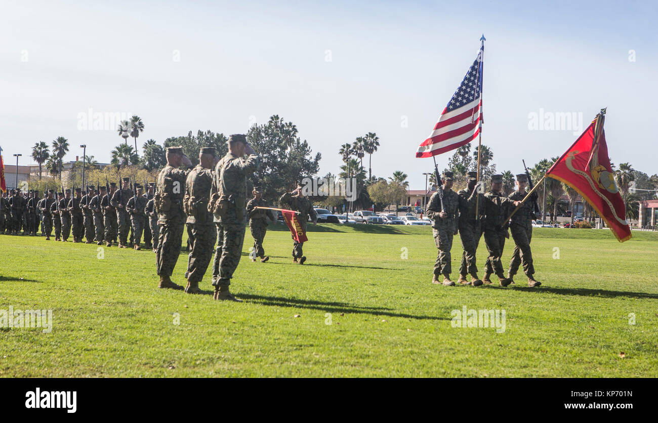 U.S. Marines with the 1st Marine Logistics Group conduct the pass and ...