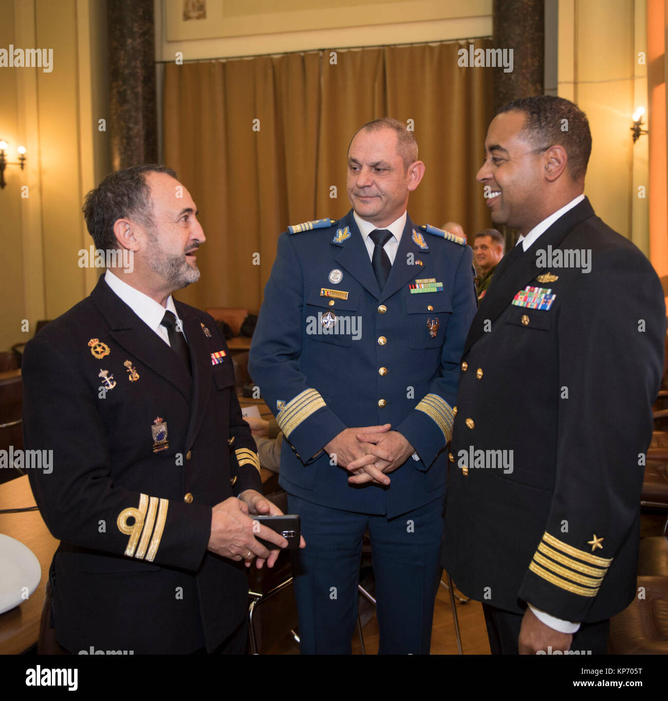 Spanish navy Cmdr. Juan Ozores, left, commander, NFU Spain, Romanian ...