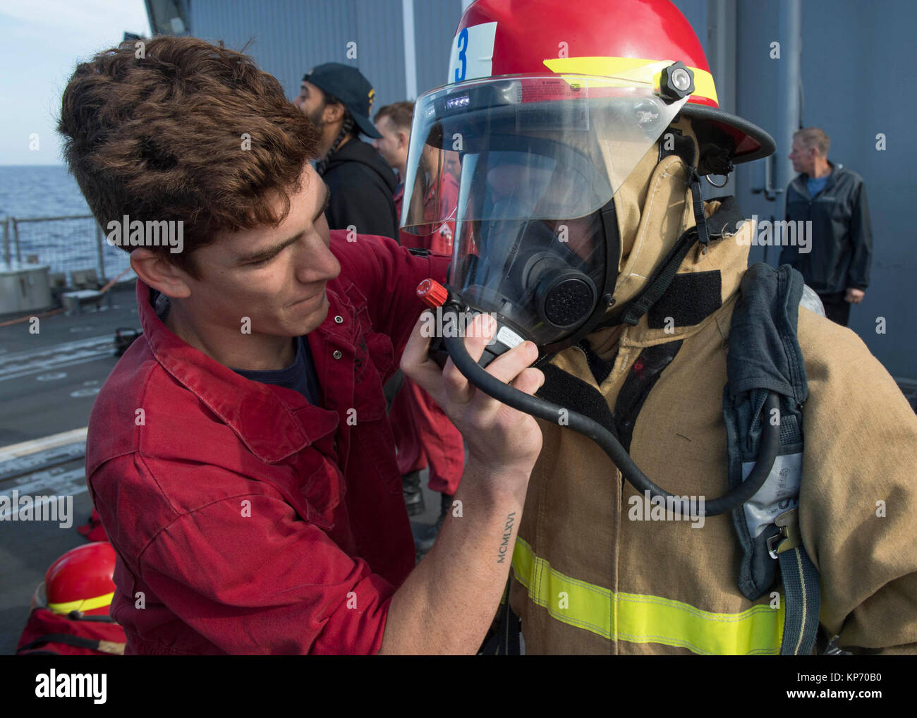 Navy ship firefighters Stock Photo - Alamy