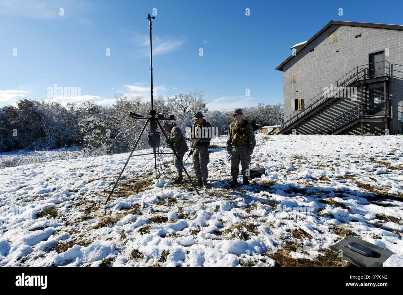 (Left to right) Tech. Sgt. Travis Stewart, Senior Airman Griffin Lowe ...