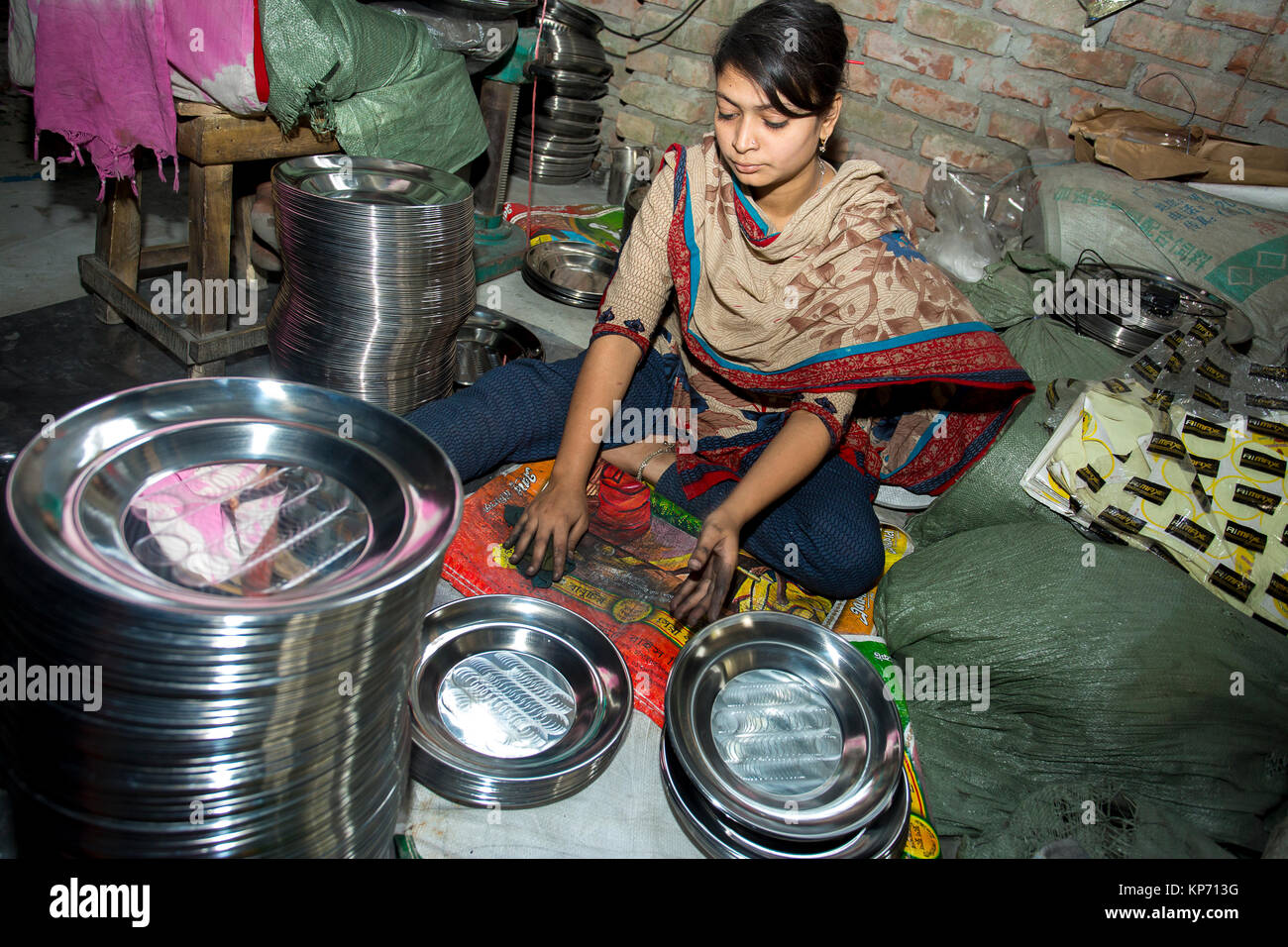 Boy washing plates hi-res stock photography and images - Alamy