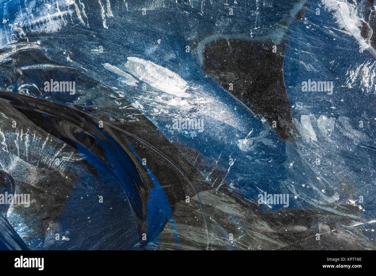 Close-up of obsidian, with its combination of dark color and glassy ...