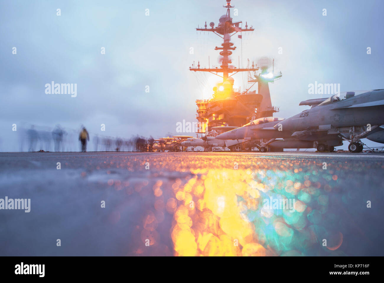 Sailors participate in a foreign object debris (FOD) walkdown on the ...