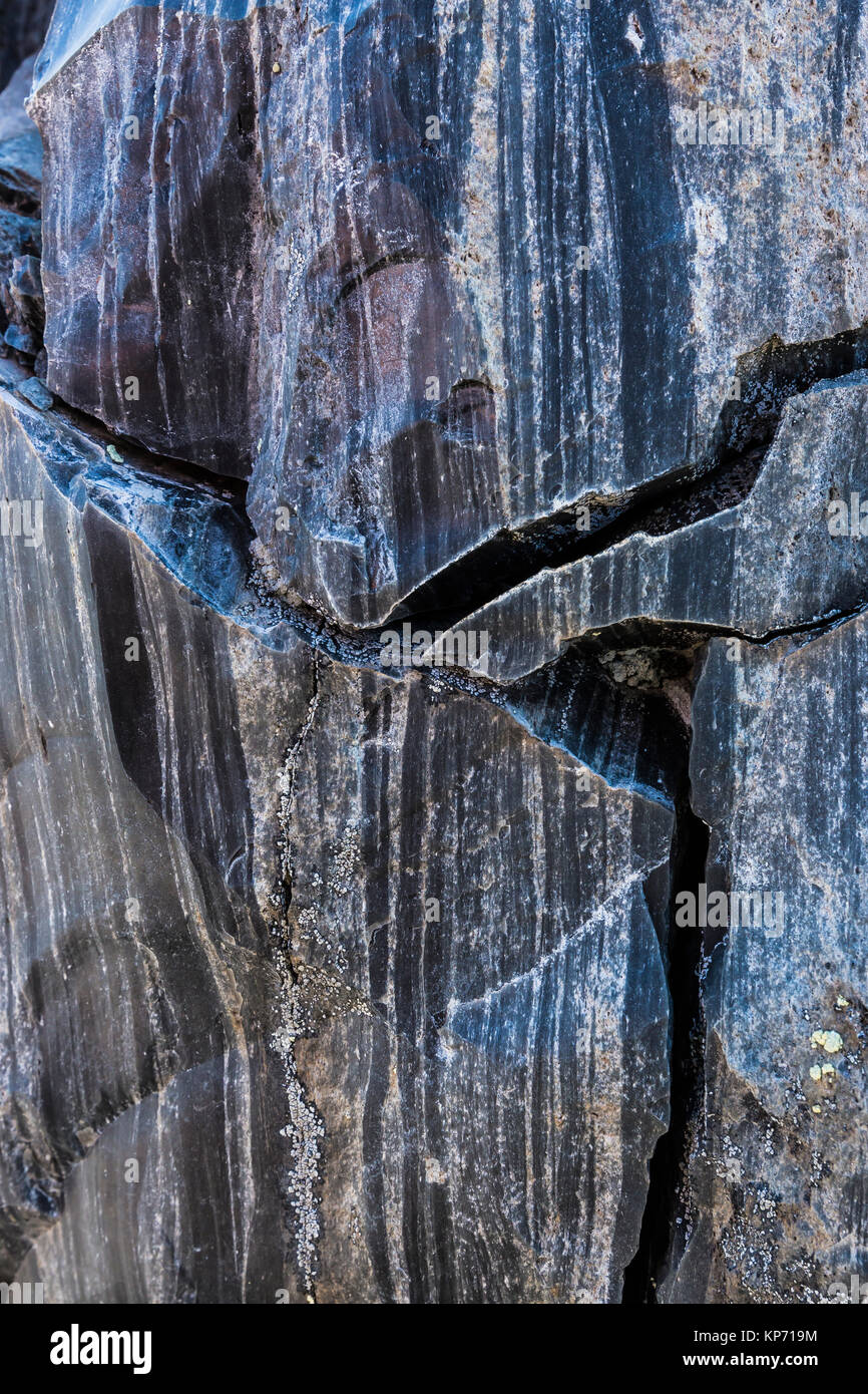 Close-up of obsidian, with its combination of dark color and glassy ...