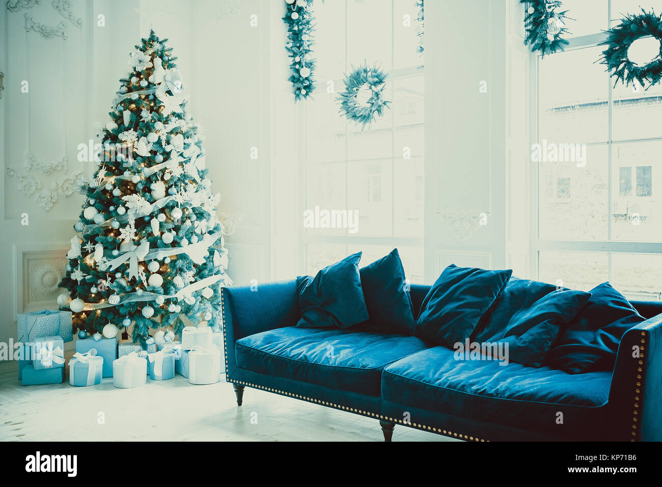 Christmas living room with a Christmas tree, sofa, gifts and a large ...