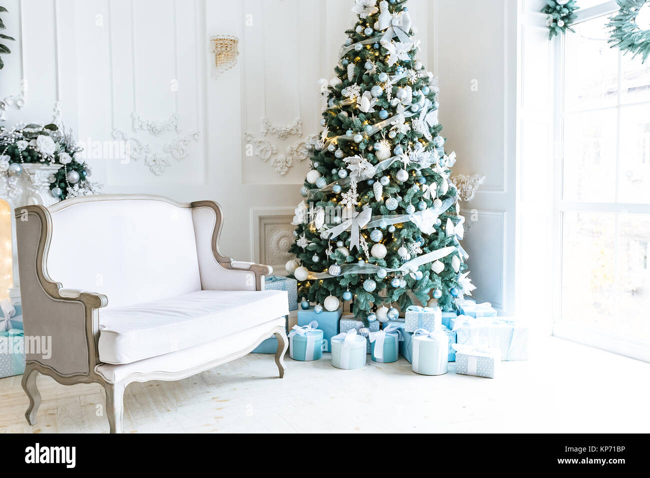 Christmas living room with a Christmas tree, sofa, gifts and a large ...