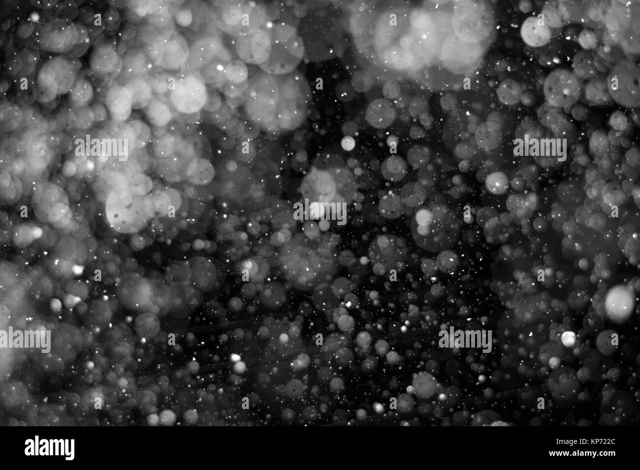 Falling snow on black background Stock Photo - Alamy