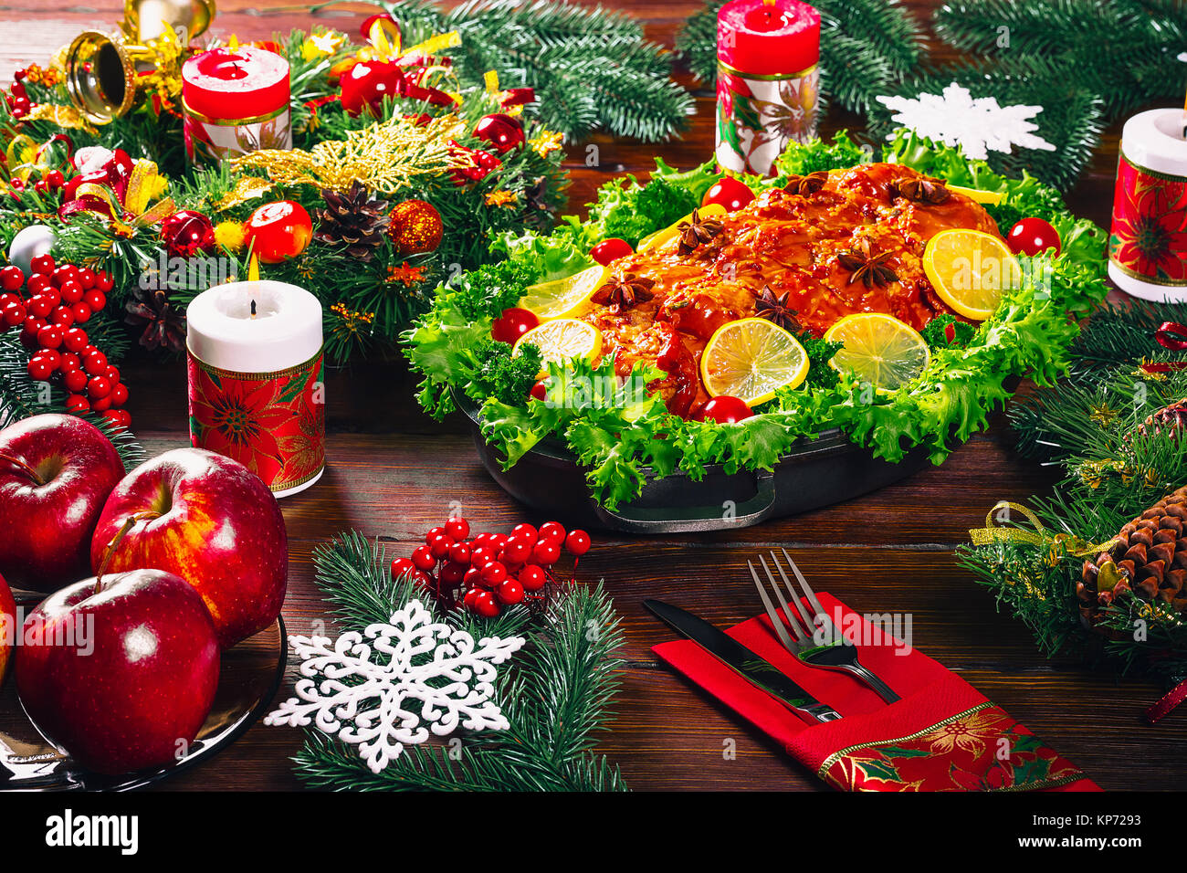 Christmas table dinner time with roasted meats decorated in Christmas ...