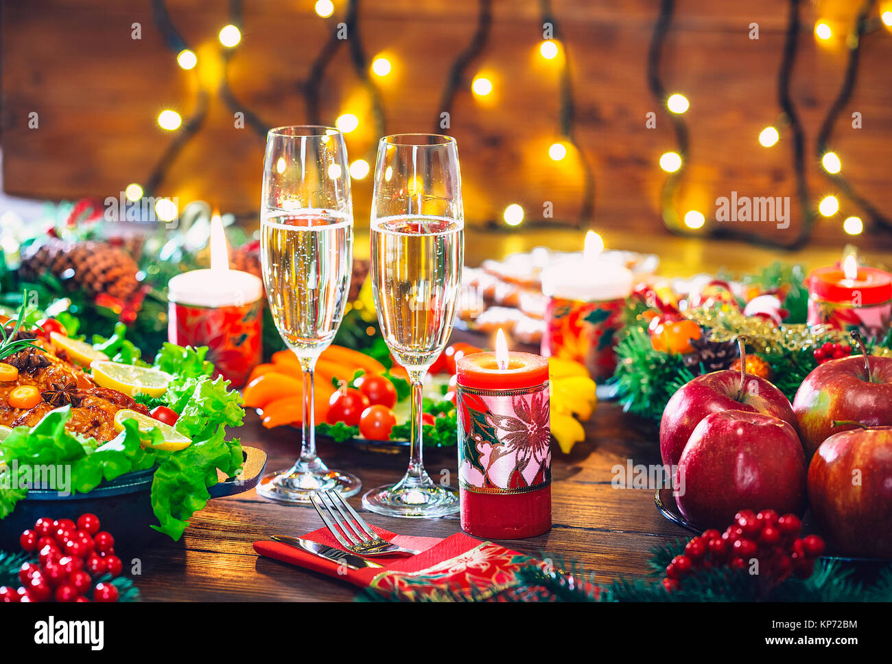 Christmas table dinner time with roasted meats decorated in Christmas ...