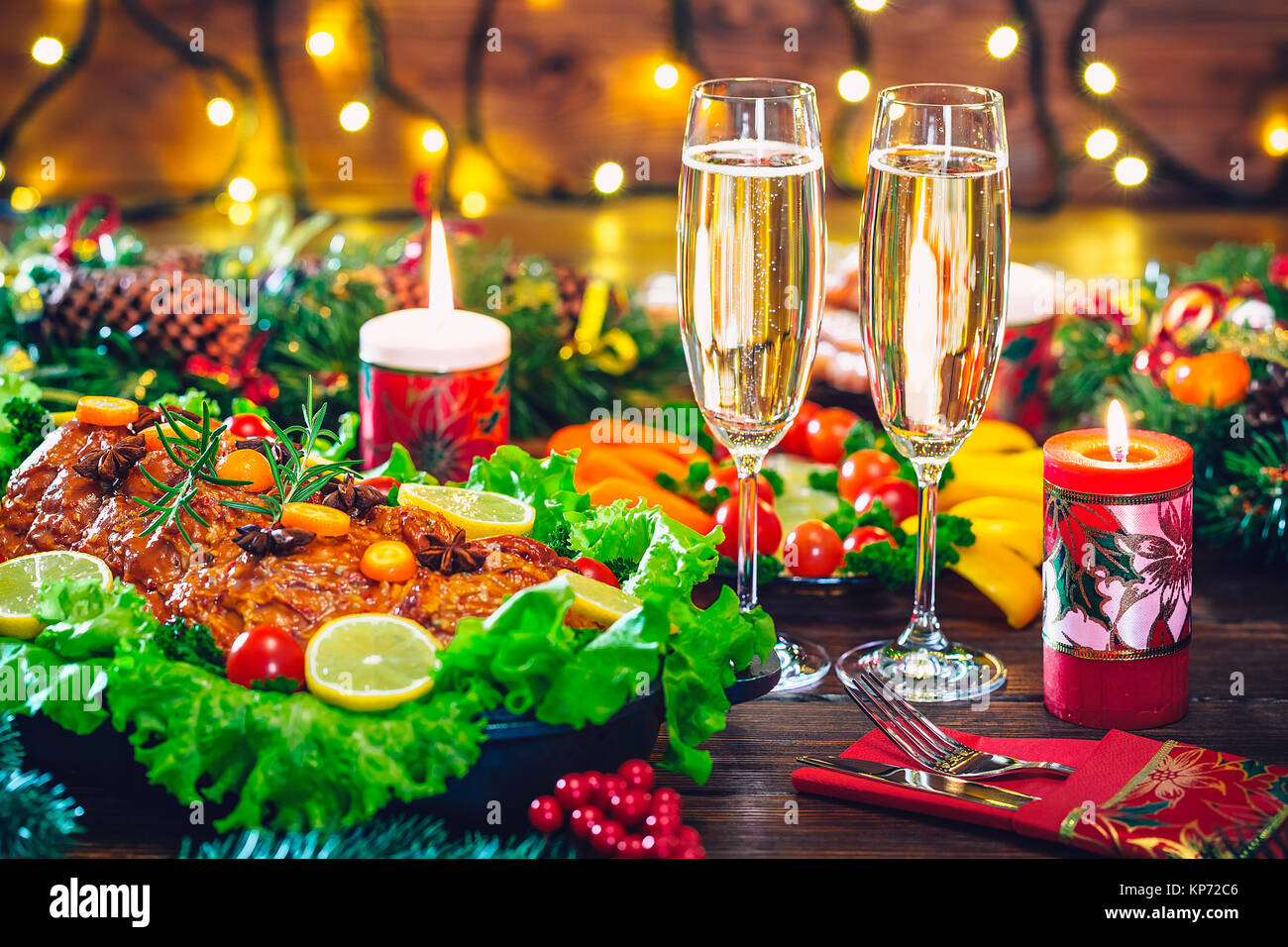Christmas table dinner time with roasted meats decorated in Christmas ...