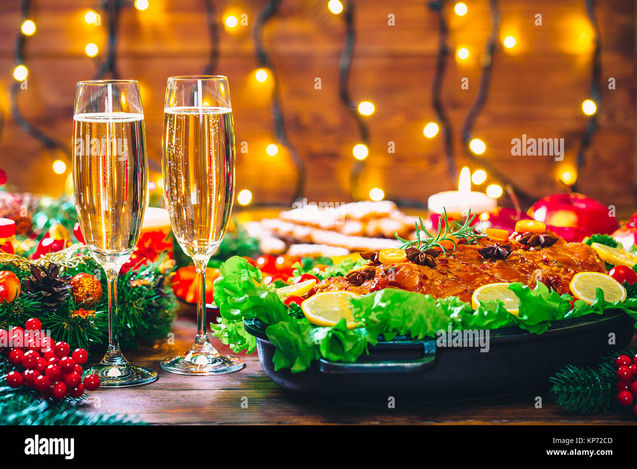 Christmas table dinner time with roasted meats decorated in Christmas ...