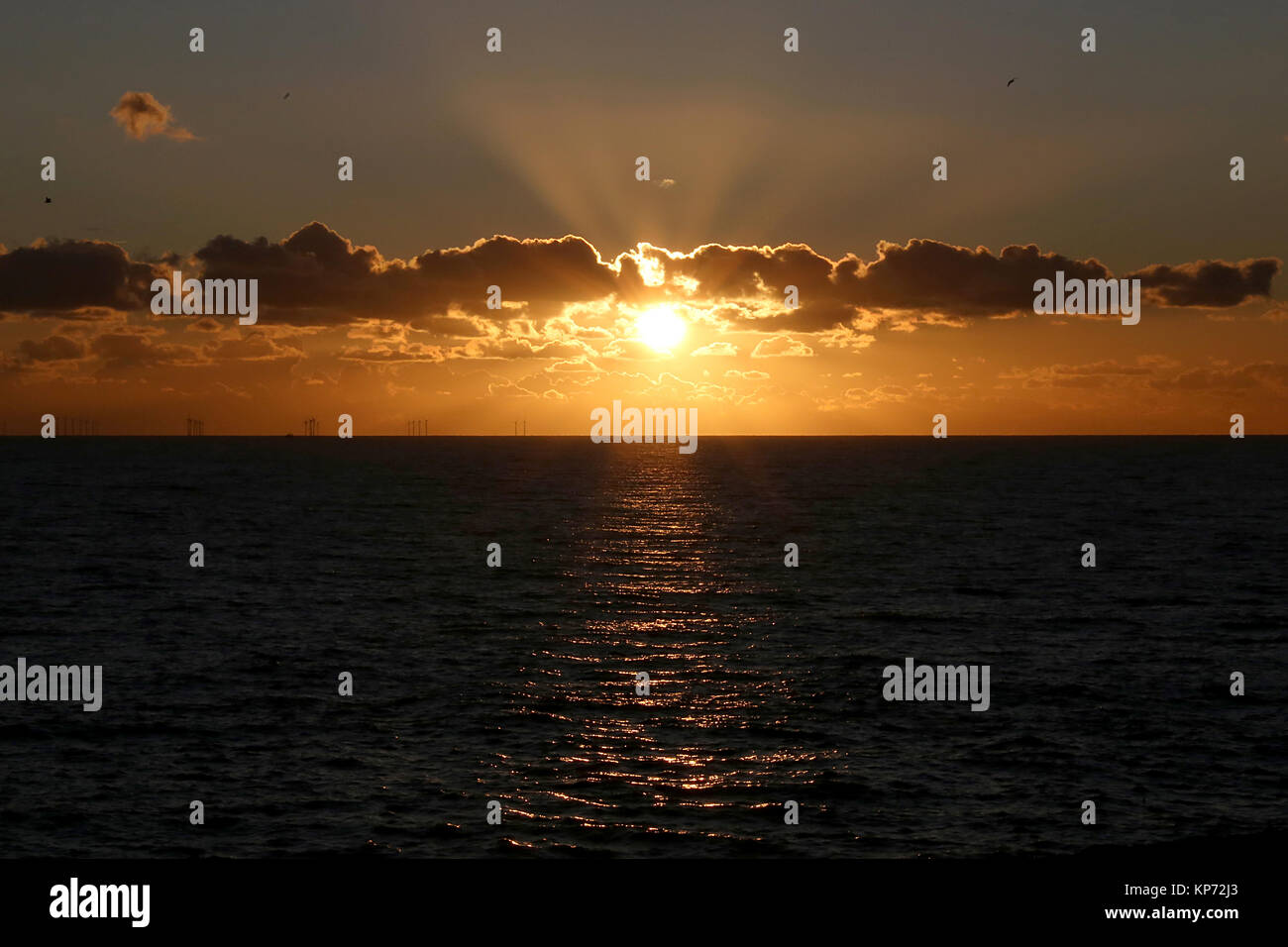 Sunset off Brighton UK Stock Photo - Alamy