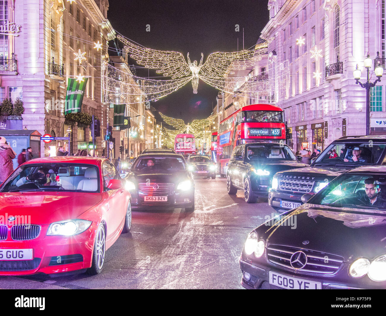 Busy crossroads at Piccadilly Circus looking towards Regent Street St ...