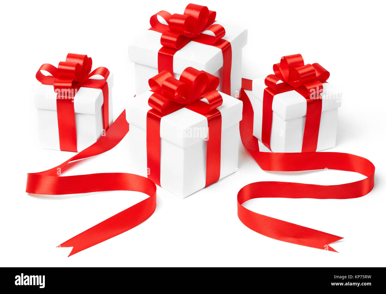 White gift box with red ribbon bow and christmas balls around, isolated ...