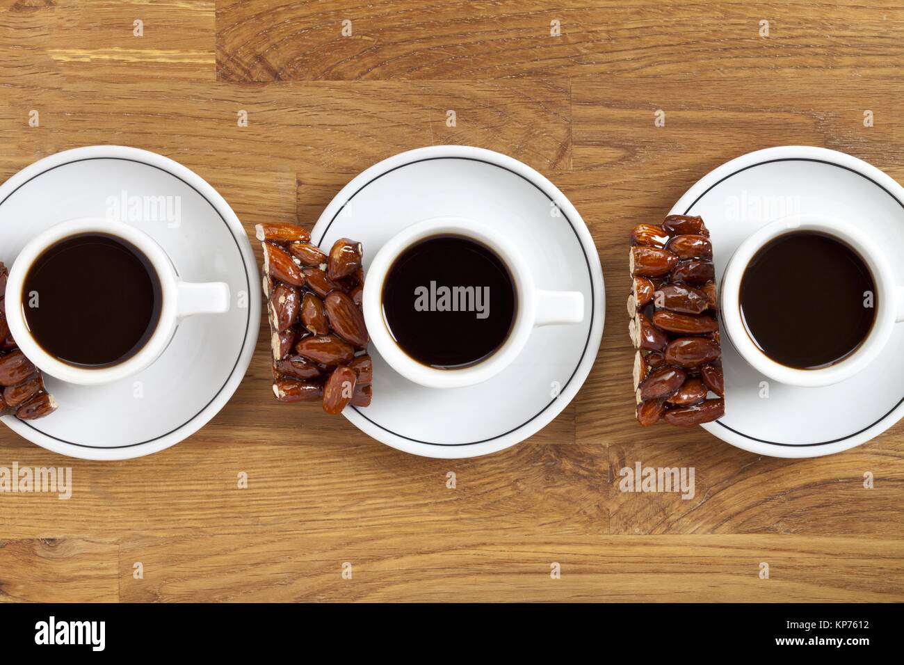 coffee cup and almond confection Stock Photo - Alamy