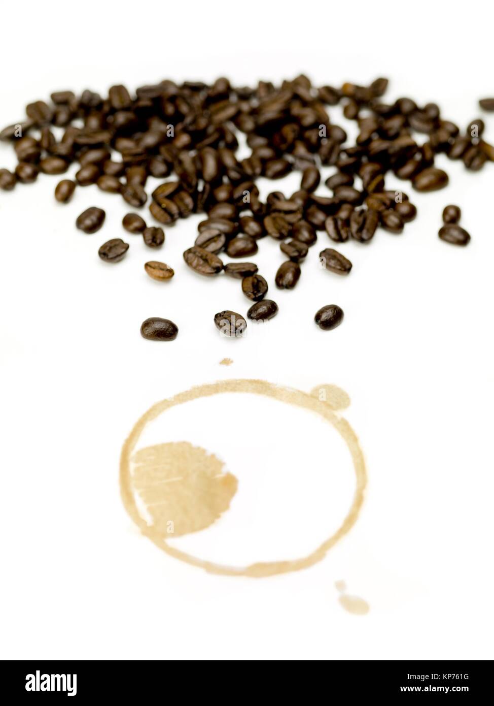 Coffee Cup Stain with Coffee Beans Stock Photo - Alamy