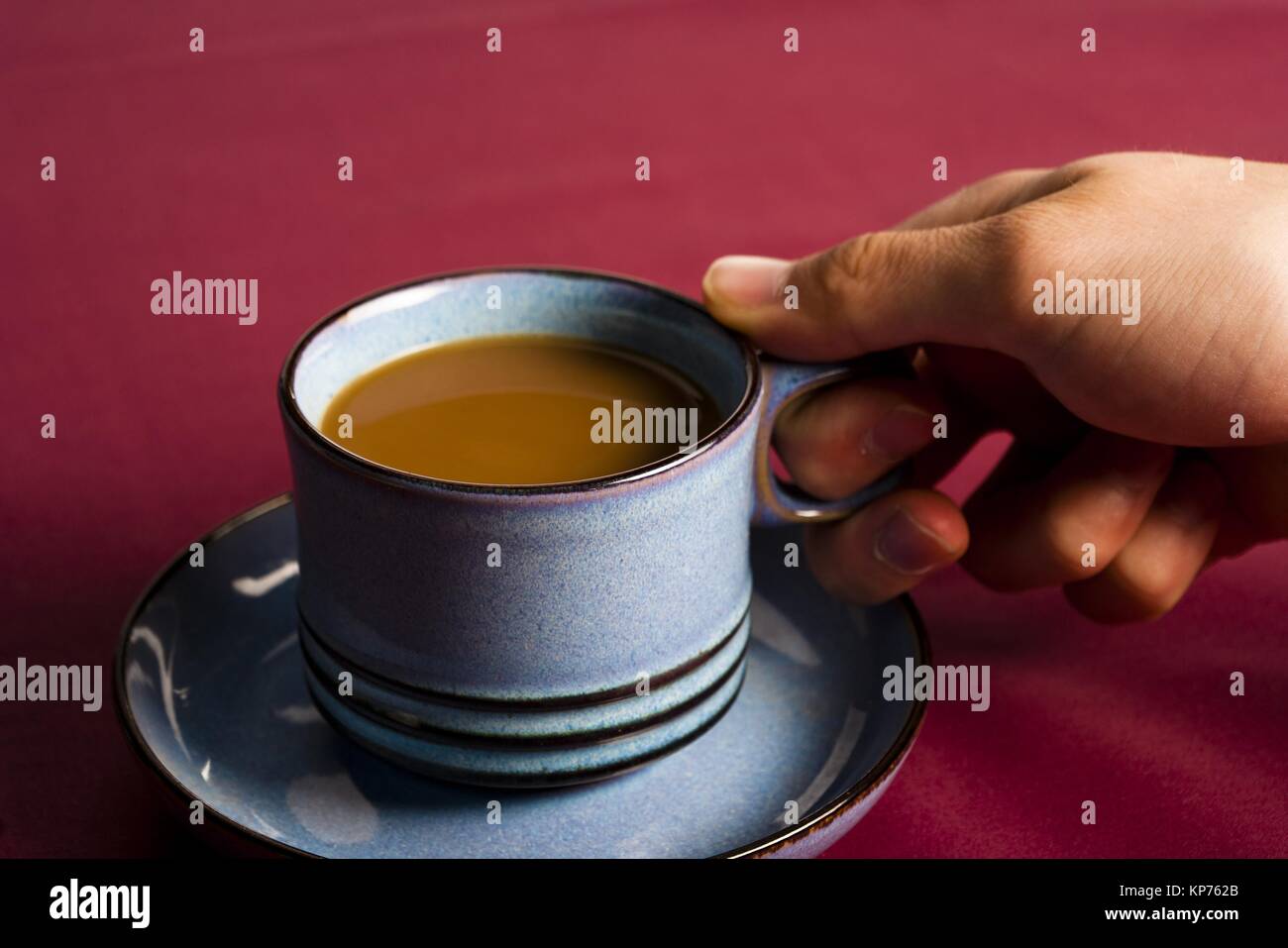 coffee mug being held Stock Photo - Alamy