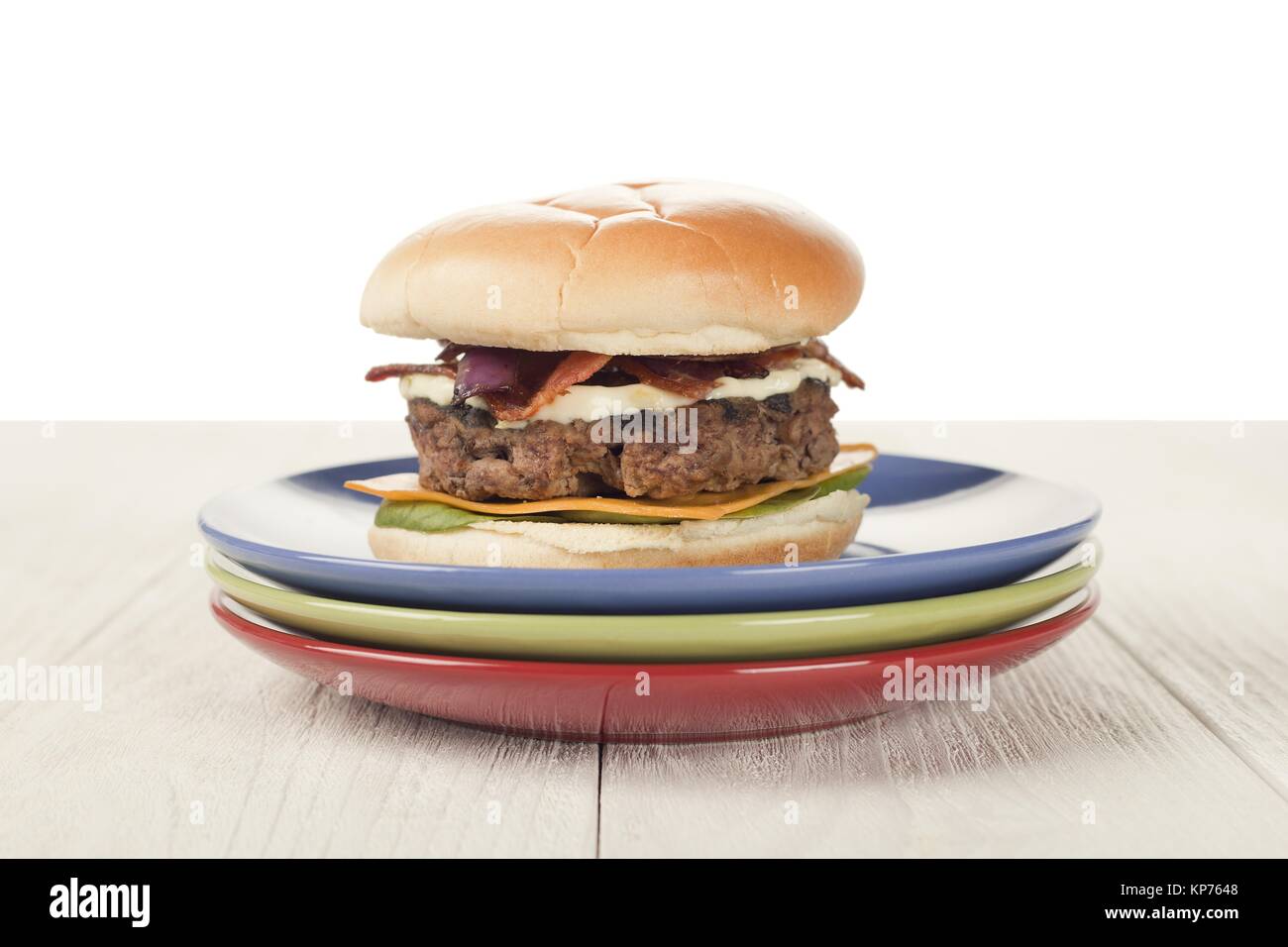 colorful plates with hamburger Stock Photo - Alamy