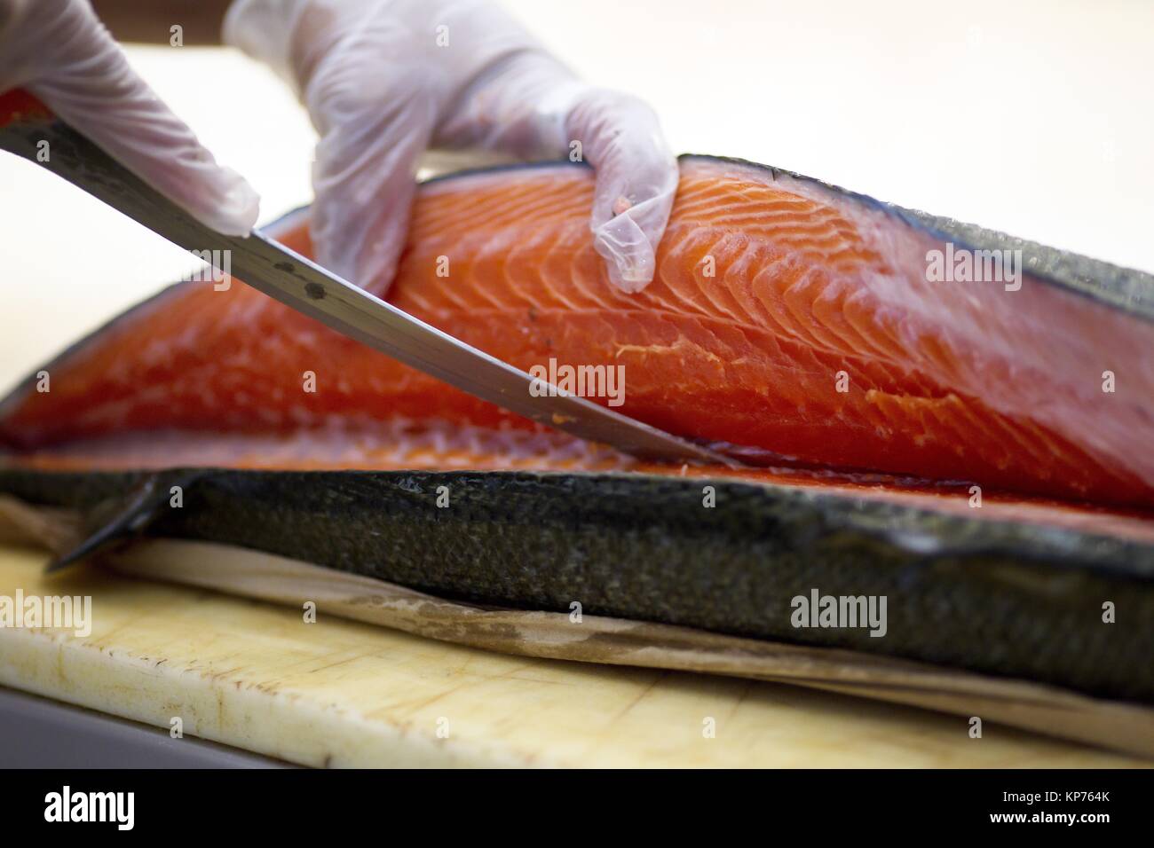 Cutting fish hi-res stock photography and images - Alamy