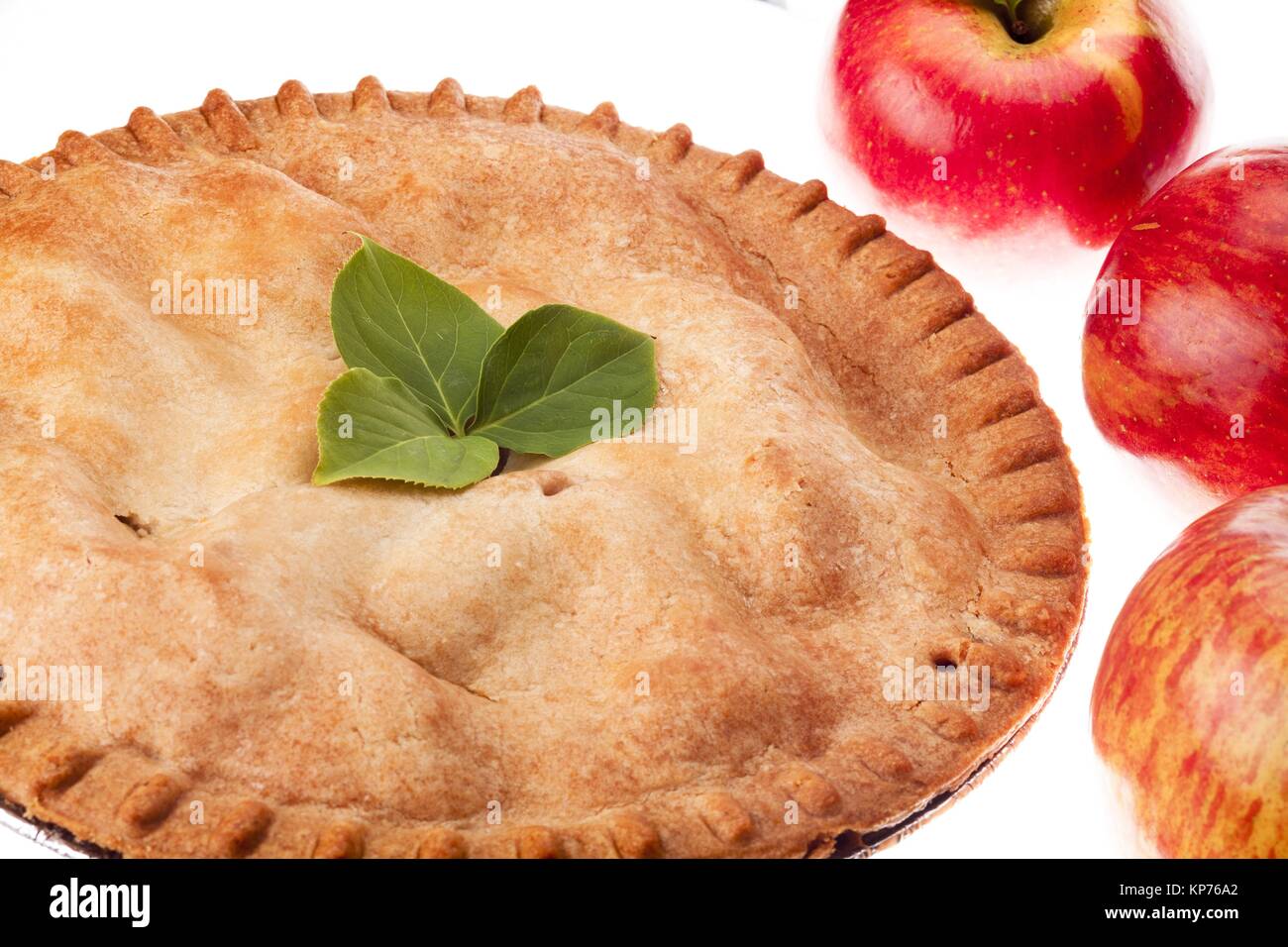 cropped image of an apple pie with apples on the side Stock Photo - Alamy