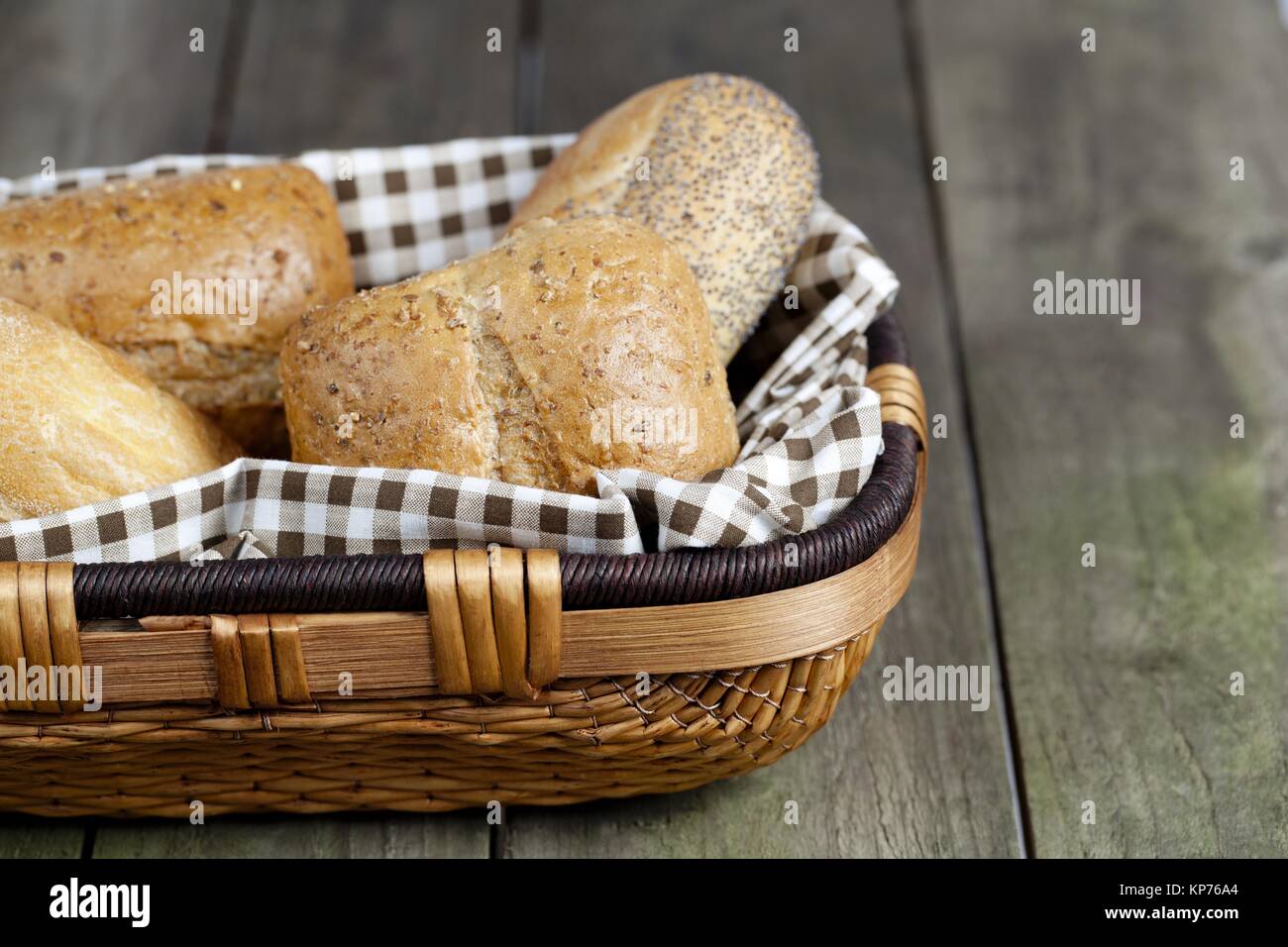 cropped image of assorted bread in basket Stock Photo - Alamy