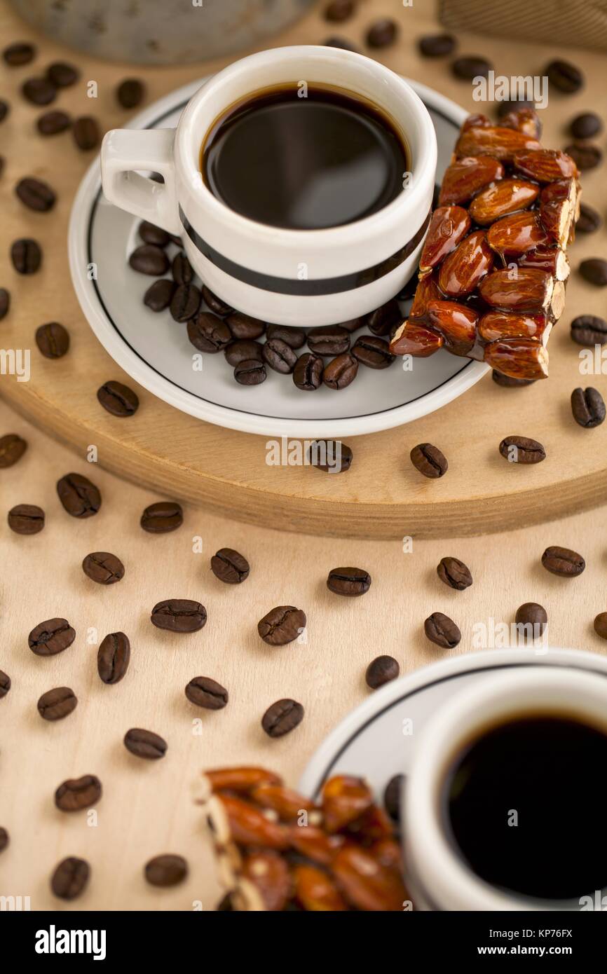 dark coffee with almond confection Stock Photo - Alamy