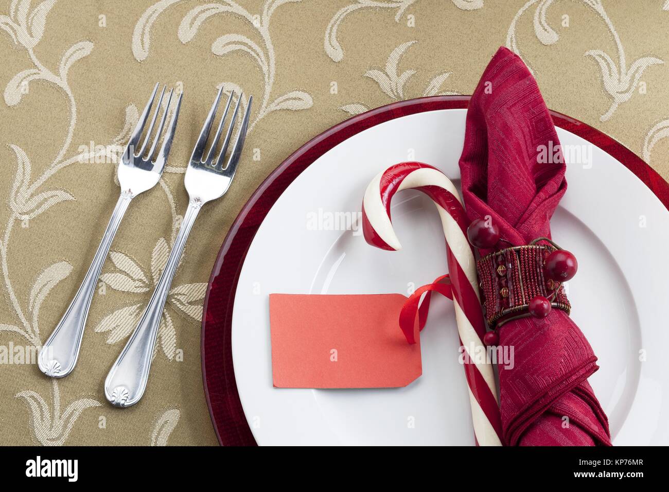 dining table with candy cane and forks Stock Photo - Alamy