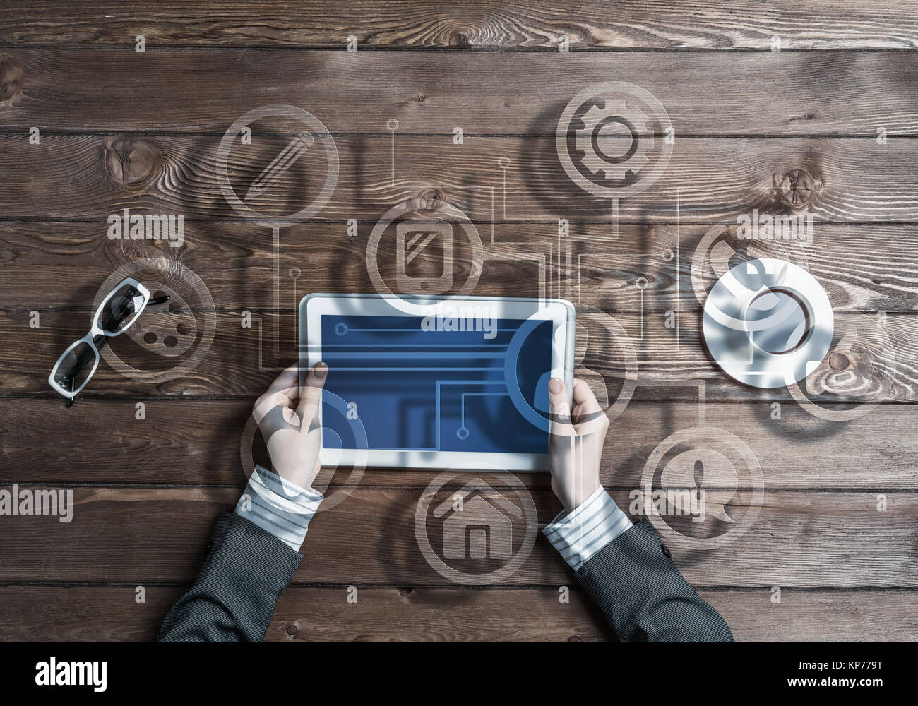 Business workplace with tablet device in female hands and media user ...