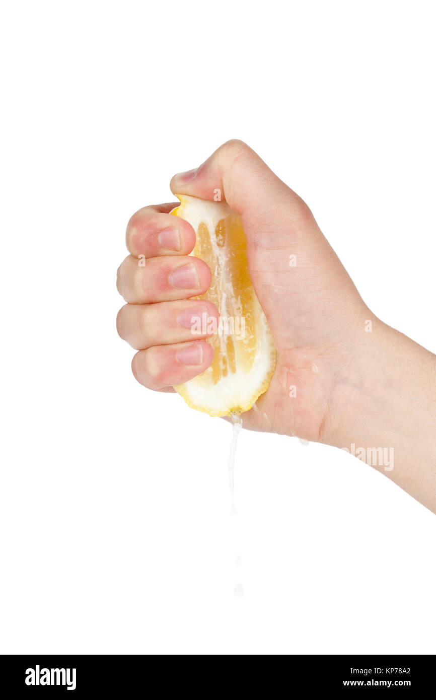 Hand pinching lemon hi-res stock photography and images - Alamy